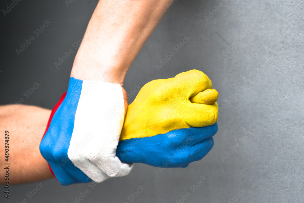 War In Ukraine With Russia Hands With Colors Of Ukrainian And Russian war-in-ukraine-with-russia-hands-with-colors-of-ukrainian-and-russian