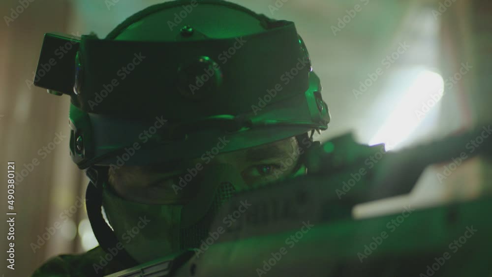 Close Up shot of portrait of special force soldier or laser tag player ...