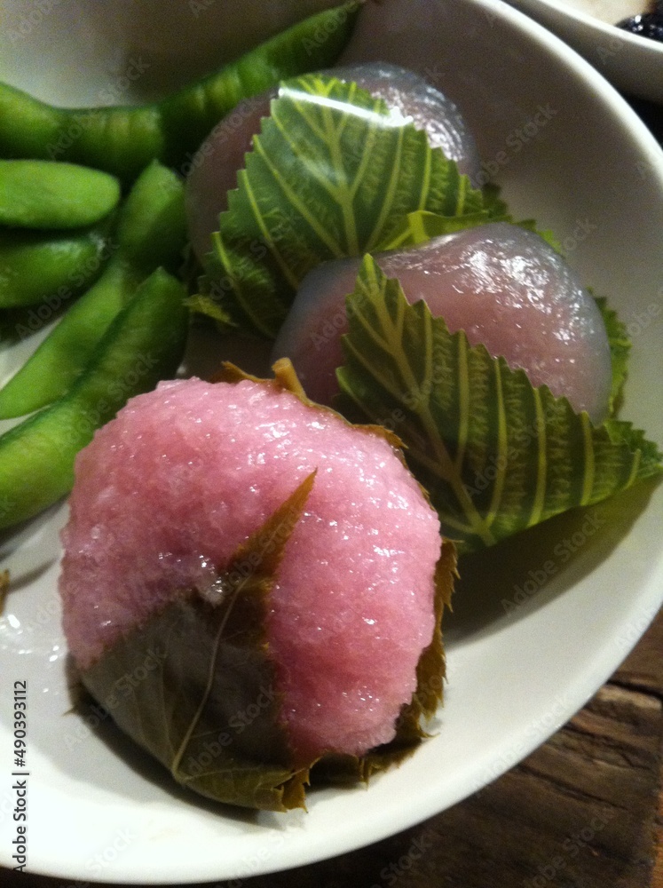 "Sakura Mochi" cherry blossom rice cake wrapped in cherry leaves, with ...