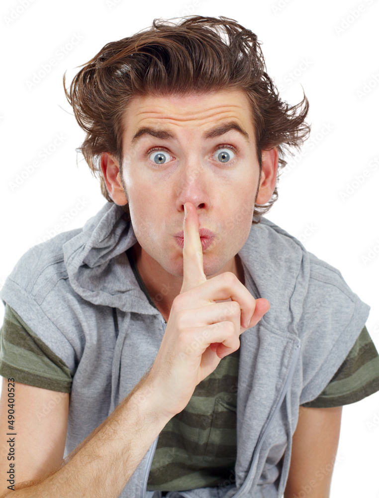 Shhhh.... Young man indicating for you to be quiet with his finger ...