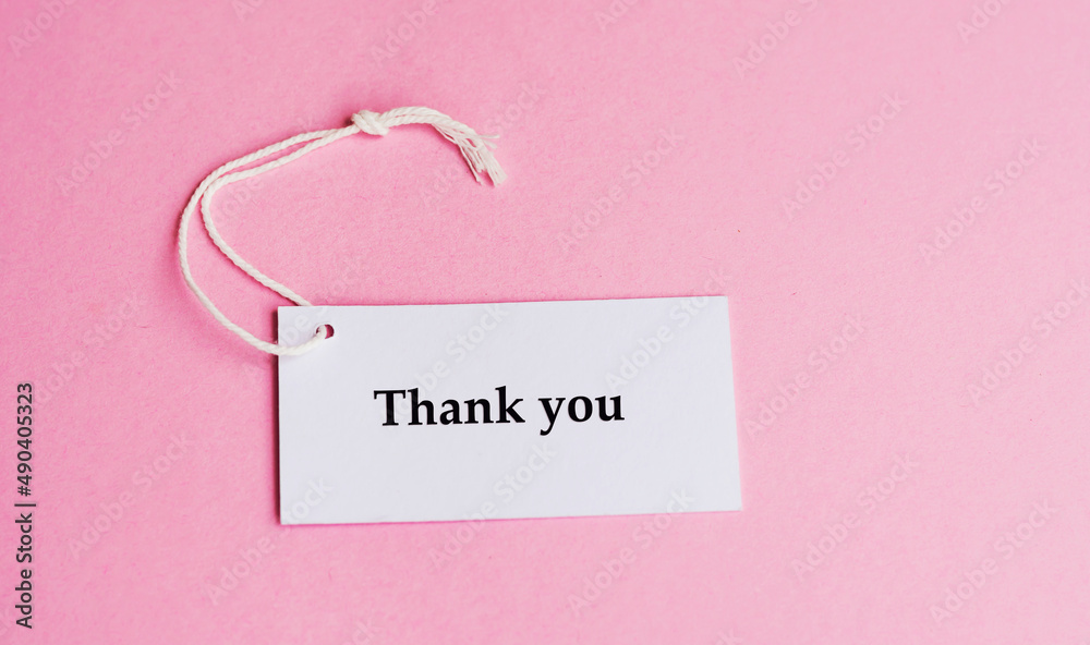 Thank you message on a pink background Stock Photo | Adobe Stock
