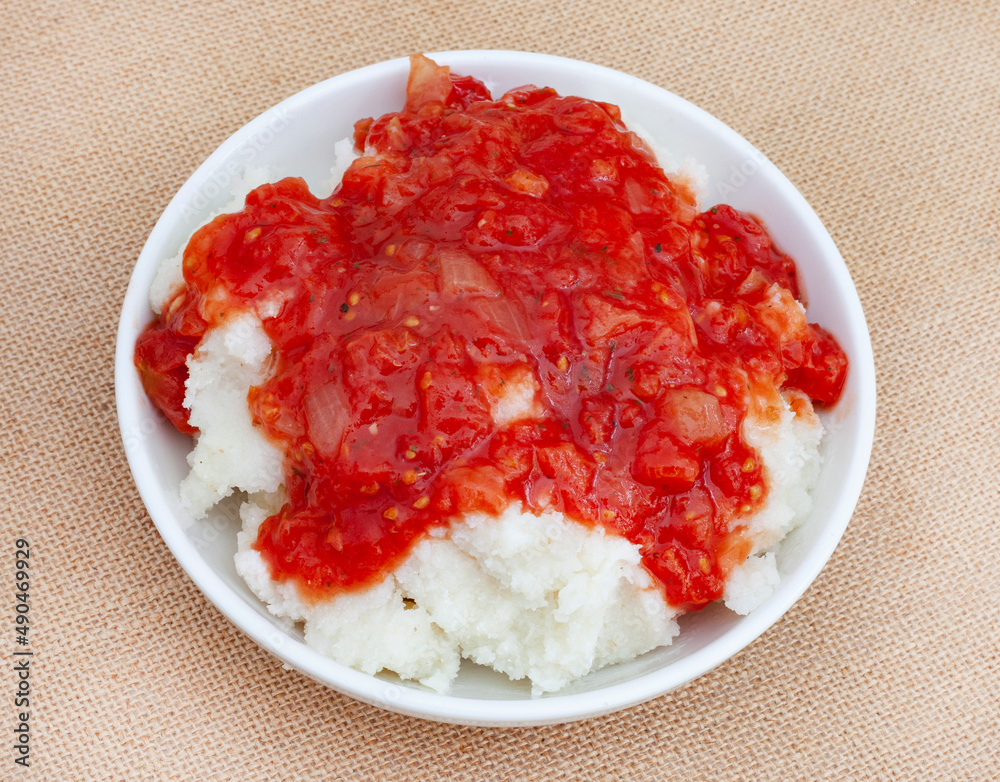 Traditional South African Pap and sous, maize meal covered in tomato ...