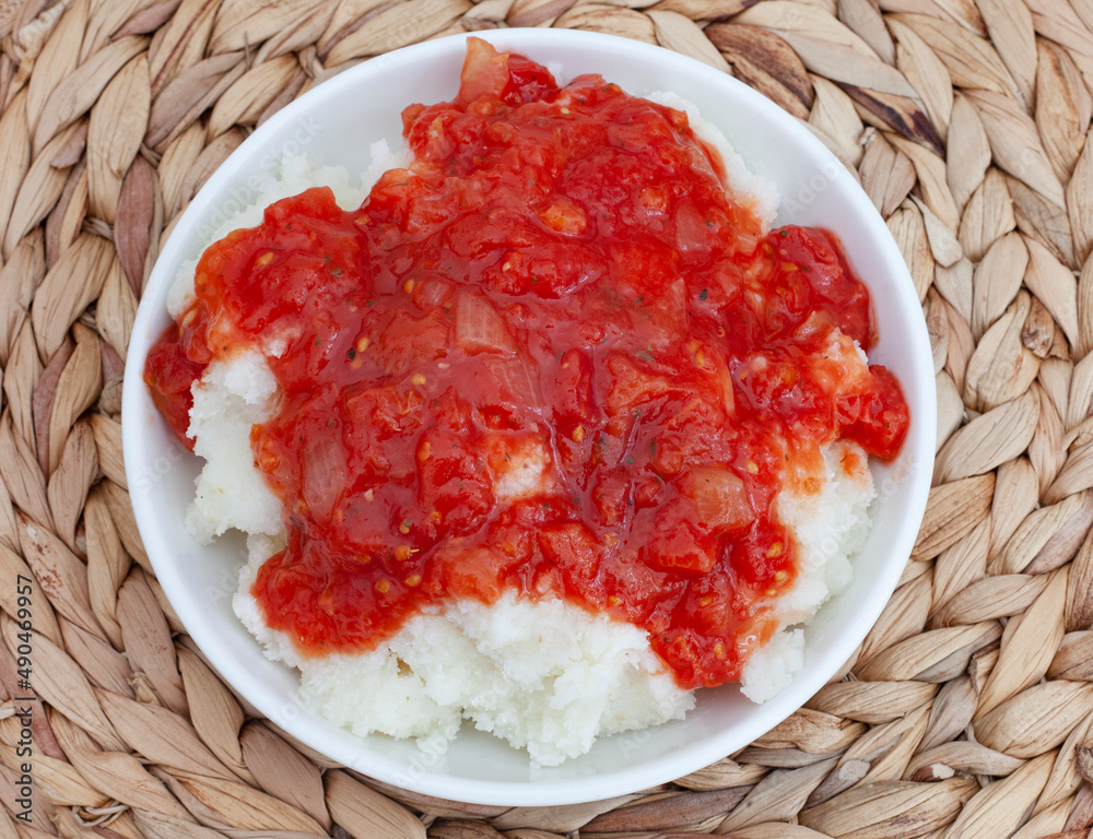 Traditional South African Pap and sous, maize meal covered in tomato ...