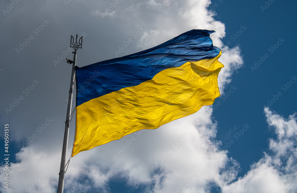 Biggest in Ukraine ukrainian national flag in Kiev on blue sky ...
