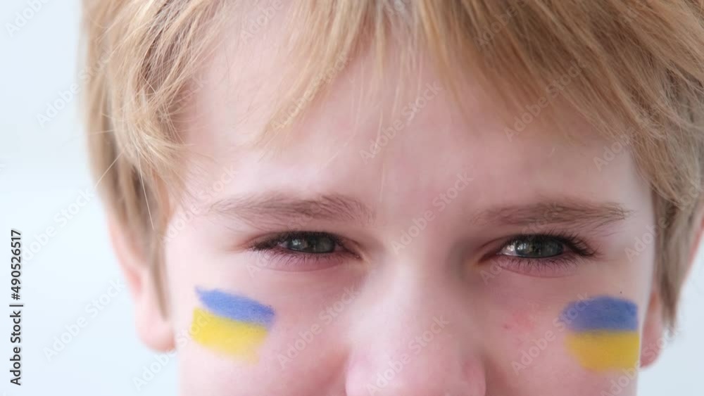 Eyes full of tears. Close-up of the child's eyes. A child with a ...