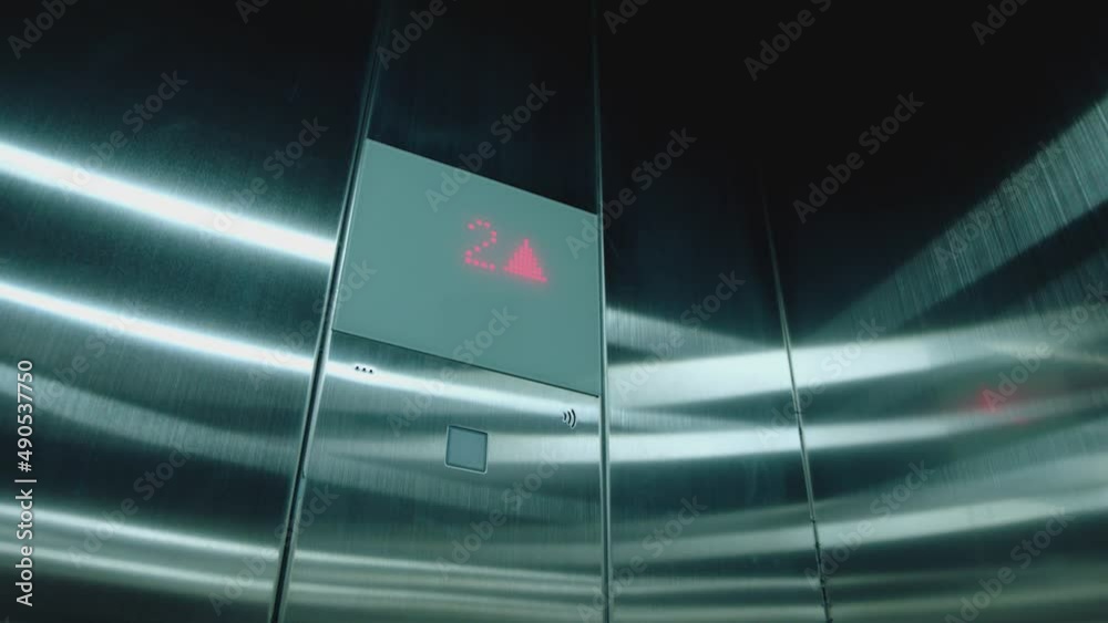 Cabin of modern passenger elevator. Digital lift scoreboard showing ...