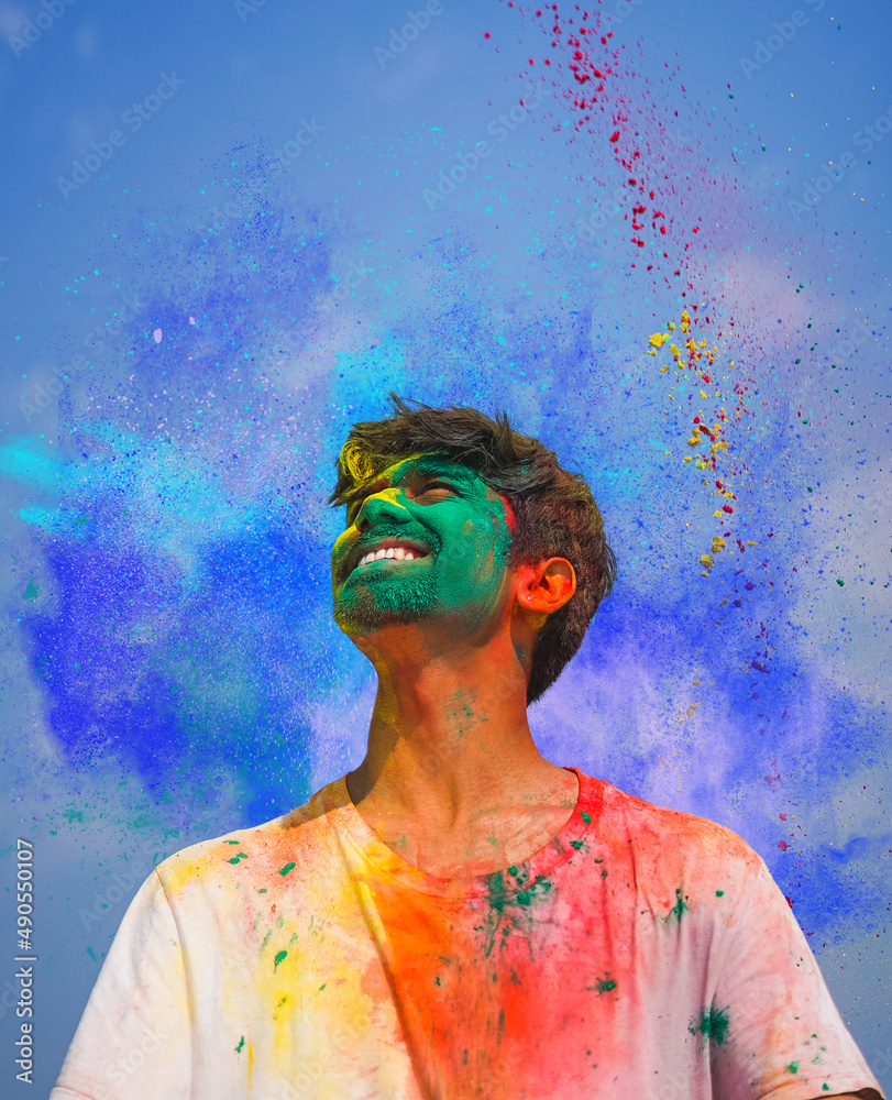 Portrait of a young indian boy playing holi. Portrait of indian boy ...