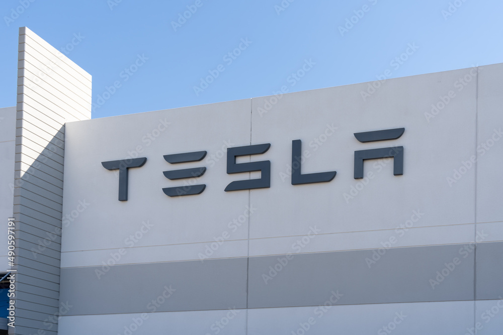 Houston, Texas, USA - March 2, 2022: Closeup of Tesla sign on the ...