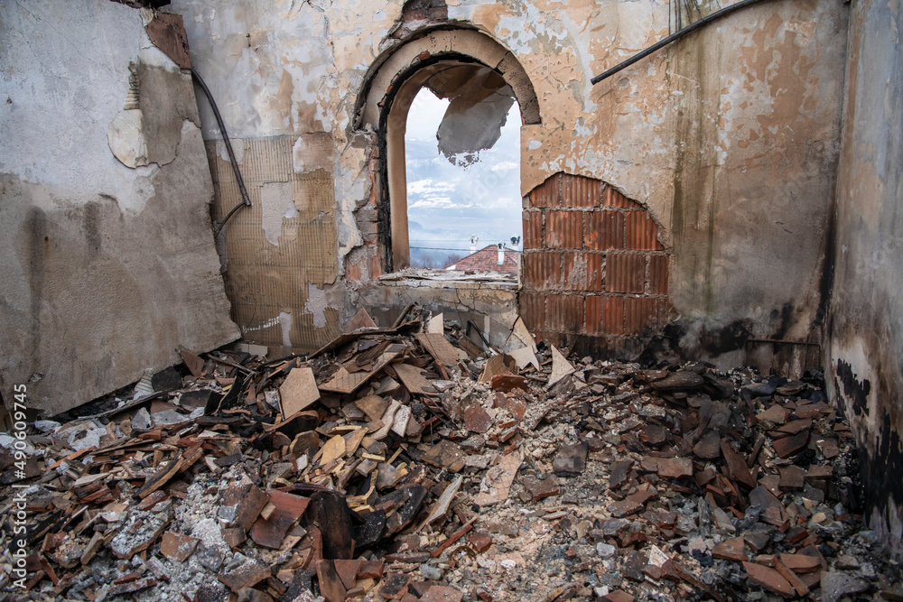 Burnt Holy Trinity Monastery in mountain village. The fire destroyed ...