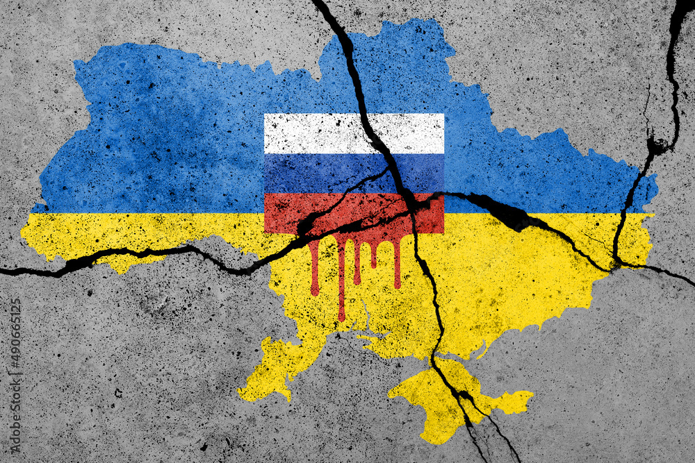 Flag of Ukraine painted on a concrete wall with Russia flag. Russian ...