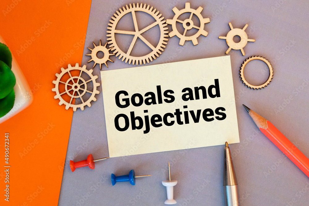 Text GOALS AND OBJECTIVES on envelope on the keyboard Stock Photo ...