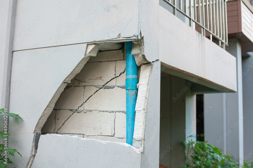 Broken concrete walls visible inside and sewer system. The concept of ...