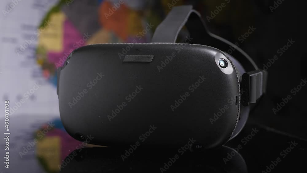 Vidéo Stock Virtual reality goggles with cameras and sensors on a black ...