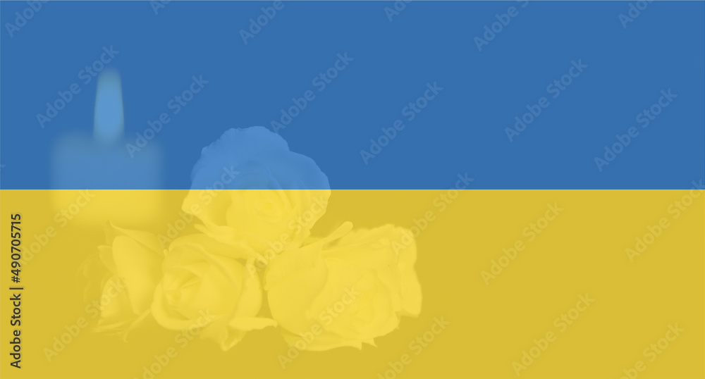White roses with a burning candle on the Ukrainian flag background ...