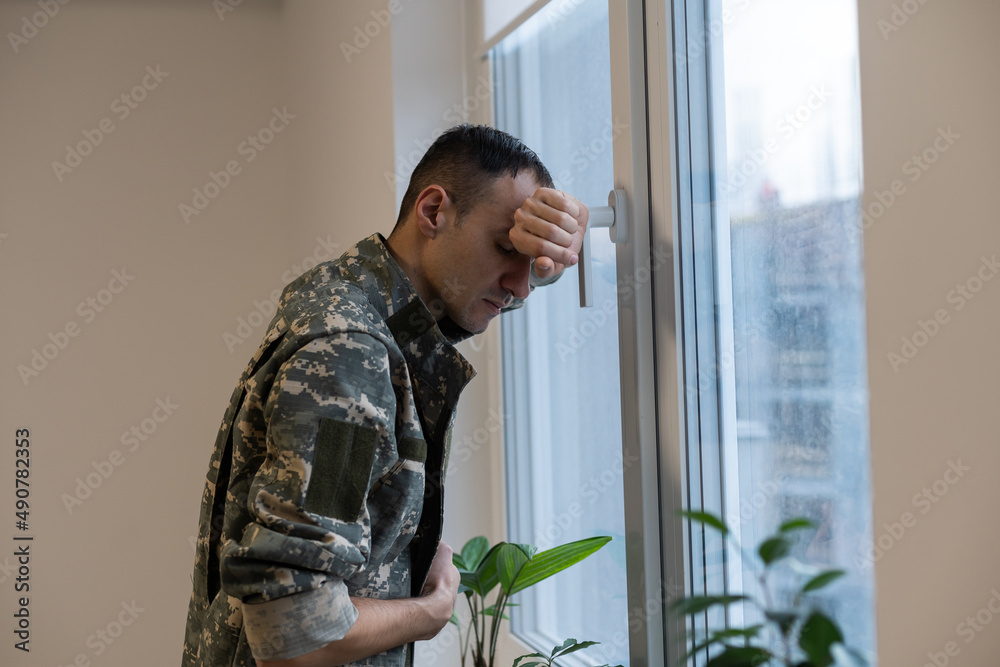 Upset soldier remembering terrifying war, suffering ptsd, psychological ...