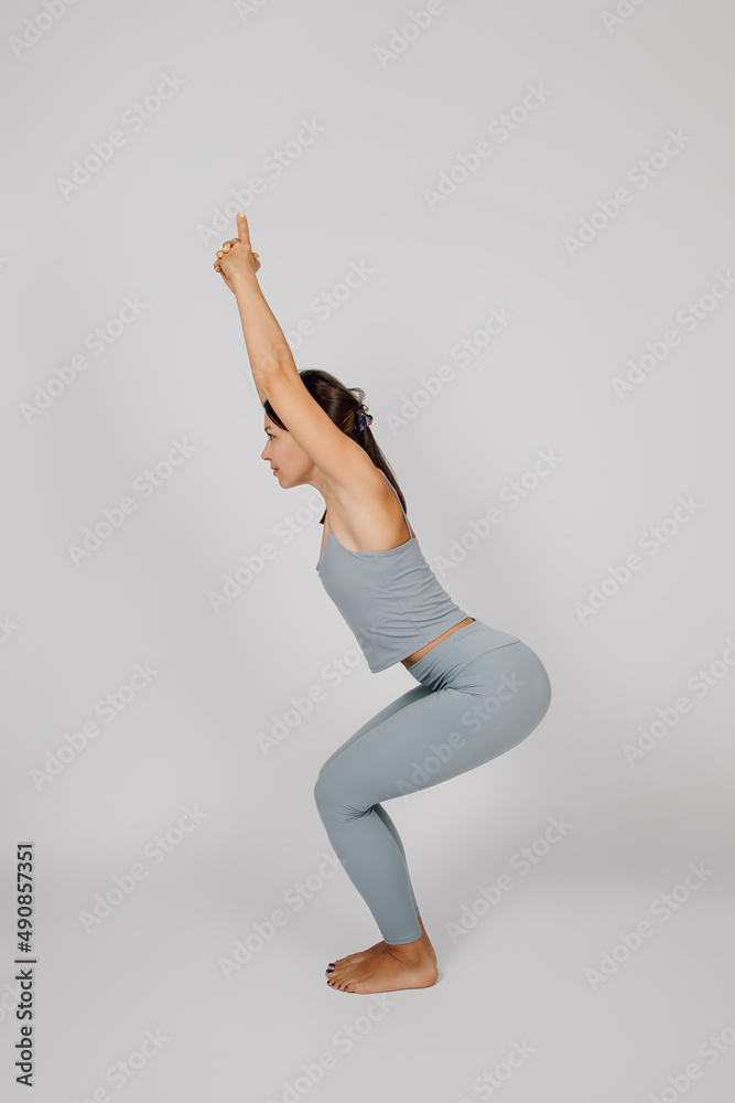 Athletic young woman posing. Concept of healthy lifestyle, brunette in ...