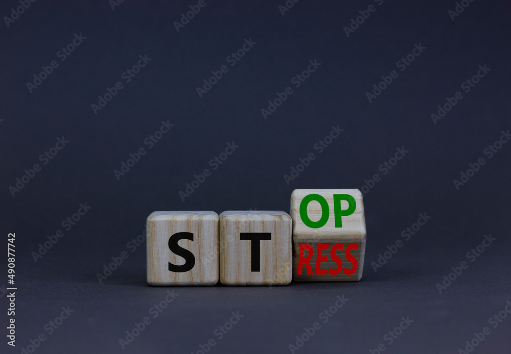 Stop stress and be health symbol. Turned the wooden cube and changed ...