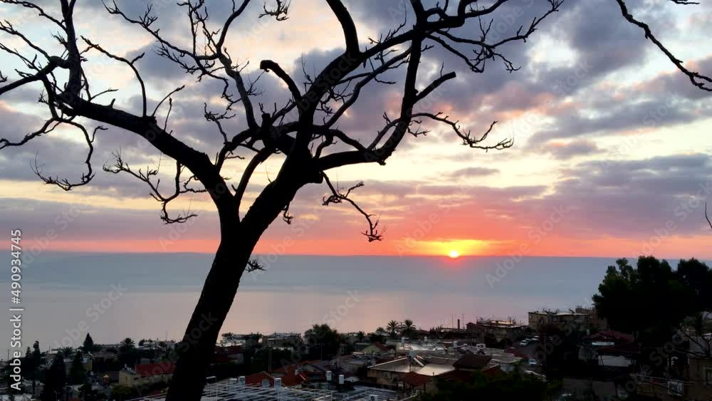 Amazing sunrise over sea shore of Sea of Galilee near Ginosar Israel ...