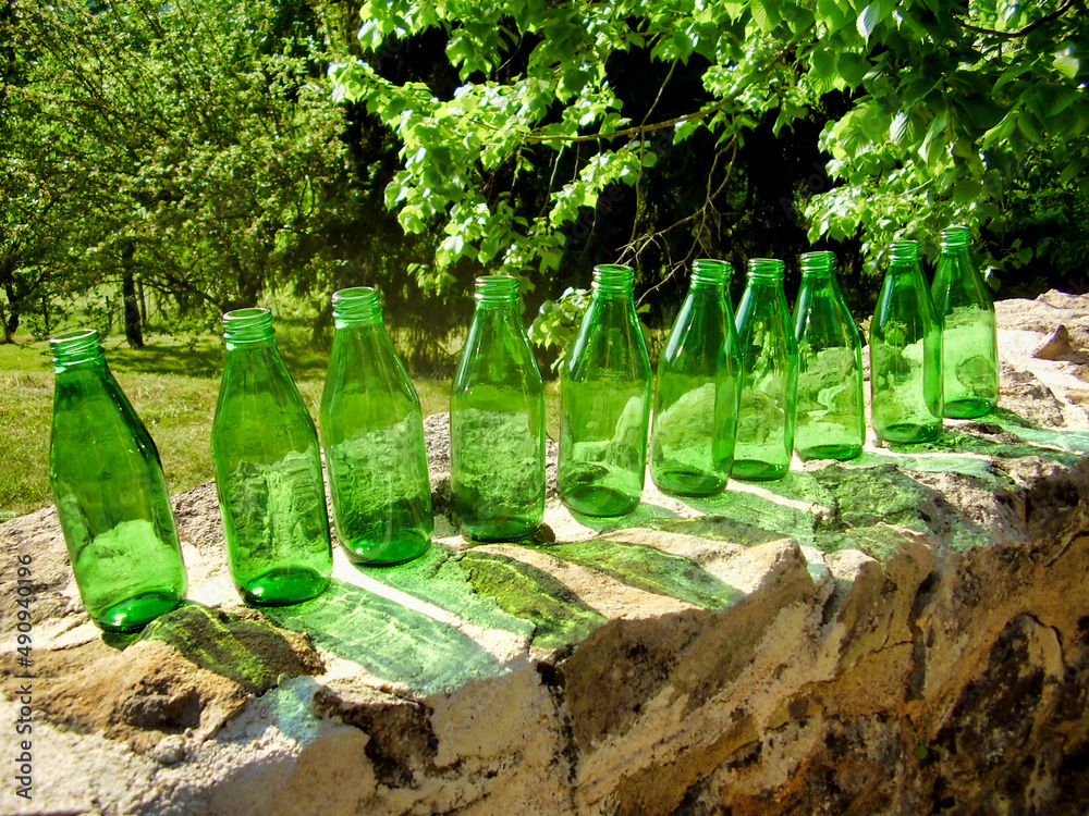 Ten Green Bottles sitting on a wall depicting a UK nursery rhyme. Stock ...