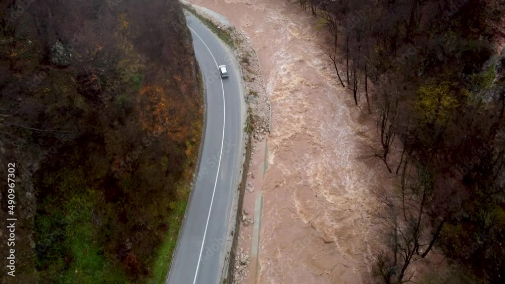 River flood, aerial drone view. Flooded roads. Water floods and ...