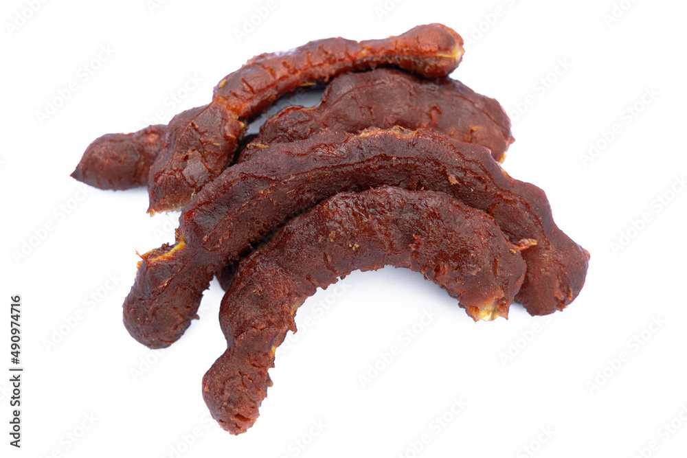 Pile of tamarind fruits on white background. Top view. Flat lay. Sticky ...