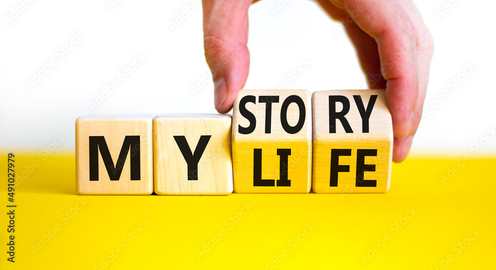 Story of my life symbol. Businessman turns wooden cubes and changes ...