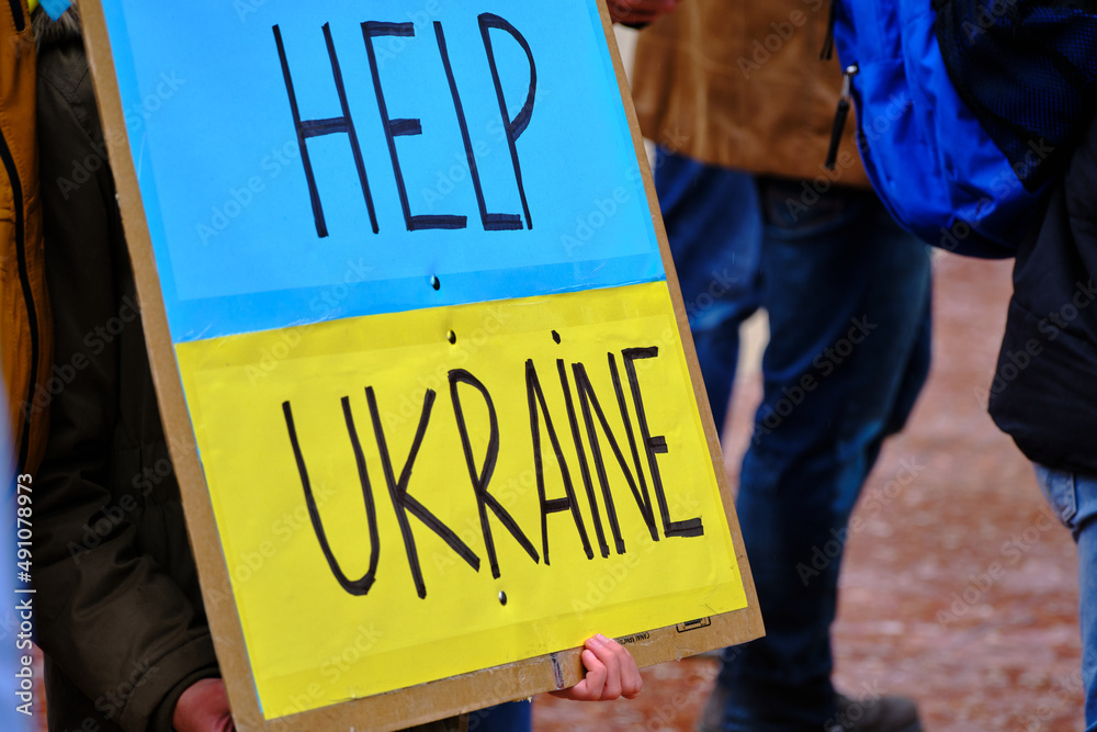poster help ukraine, with the colors of the flag in a protest against ...