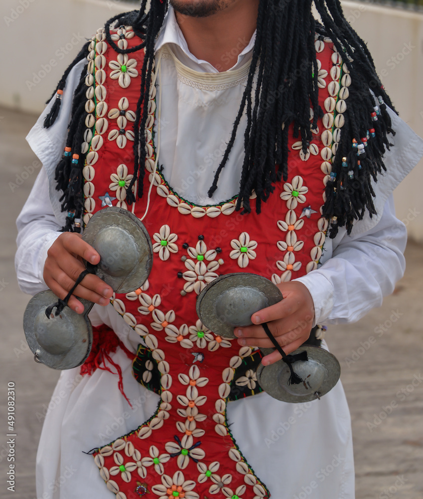 The music of Gnawa is a mix of African, Arab and Berber music and dance ...