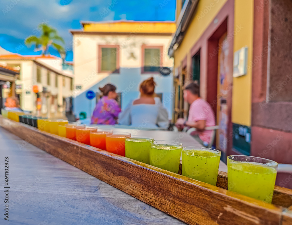 Shoot of a colorful set of Poncha - traditional alcoholic drink from ...