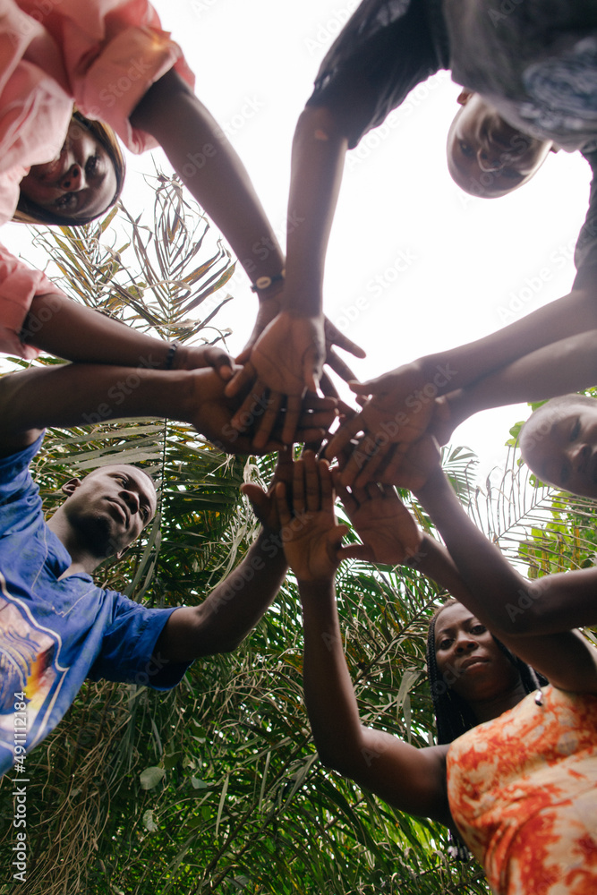 circle of activism a group of hands together protecting nature Stock ...