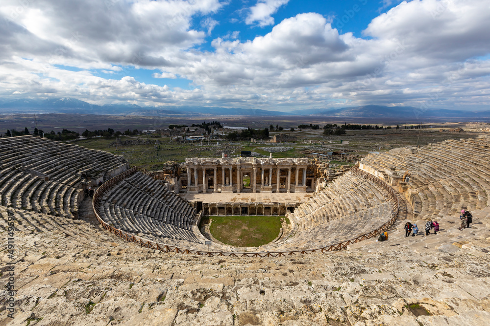 Amphitheater in ancient city of the Hierapolis. Dramatic sunset sky ...