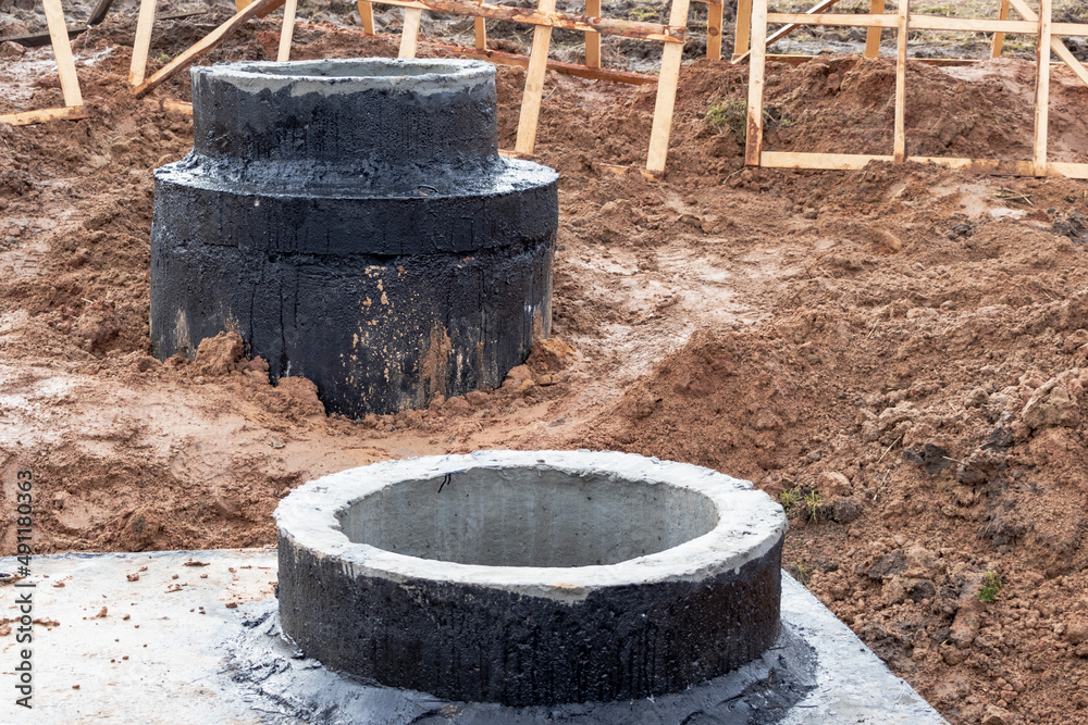 Installation of a reinforced concrete well for water supply and ...
