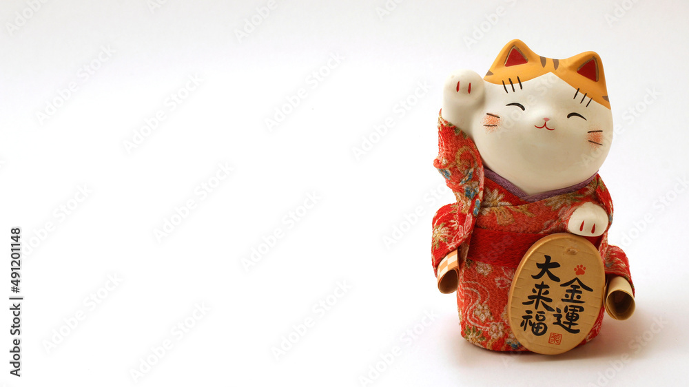 Maneki neko. Typical Japanese cat of fortune. Stock Photo | Adobe Stock