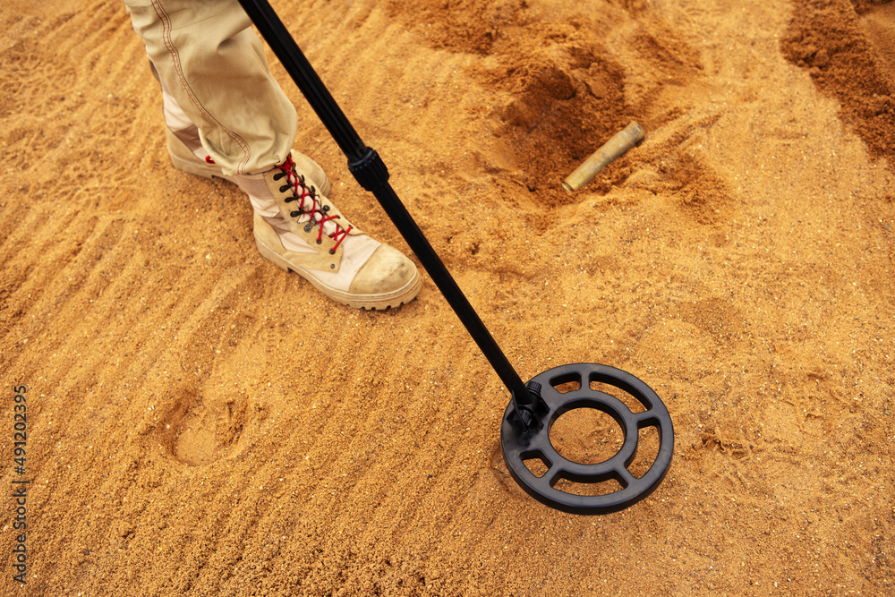 Sapper. The process of demining an area with sandy soil. Training ...