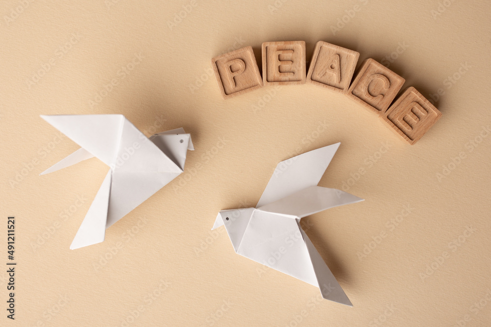 Two white paper dove birds as symbol of peace, international day of ...