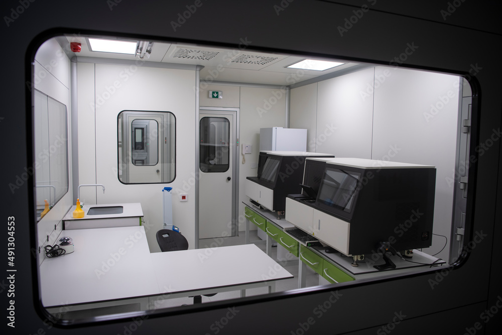 Futuristic laboratory with devices for DNA research, genome sequencing ...