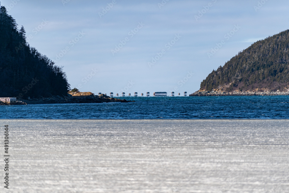 A wide view of frozen ice or slob in a cove. This ice has patches of ...