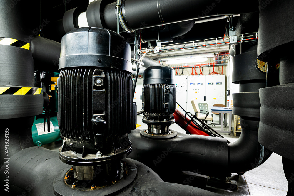 Pump station in the underground premises of the factory, heat station ...