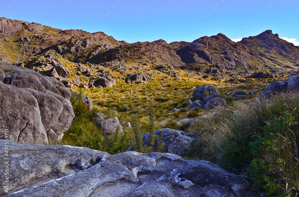 Rocky peaks towering above the boulder-filled high plateau of Itatiaia ...