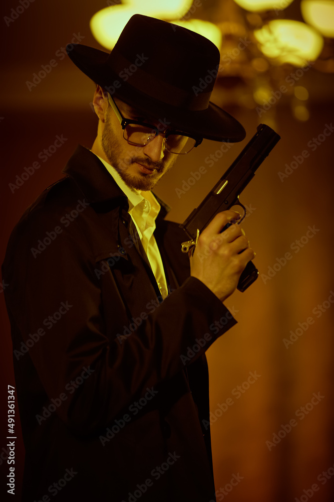 gangster with gun Stock Photo | Adobe Stock