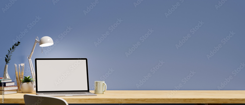Stylish office workspace with laptop mockup over blue wall. Stock Photo ...