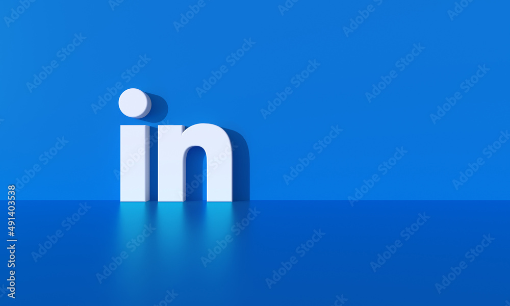 Linkedin logo on blue wall background with hard shadow and space for ...
