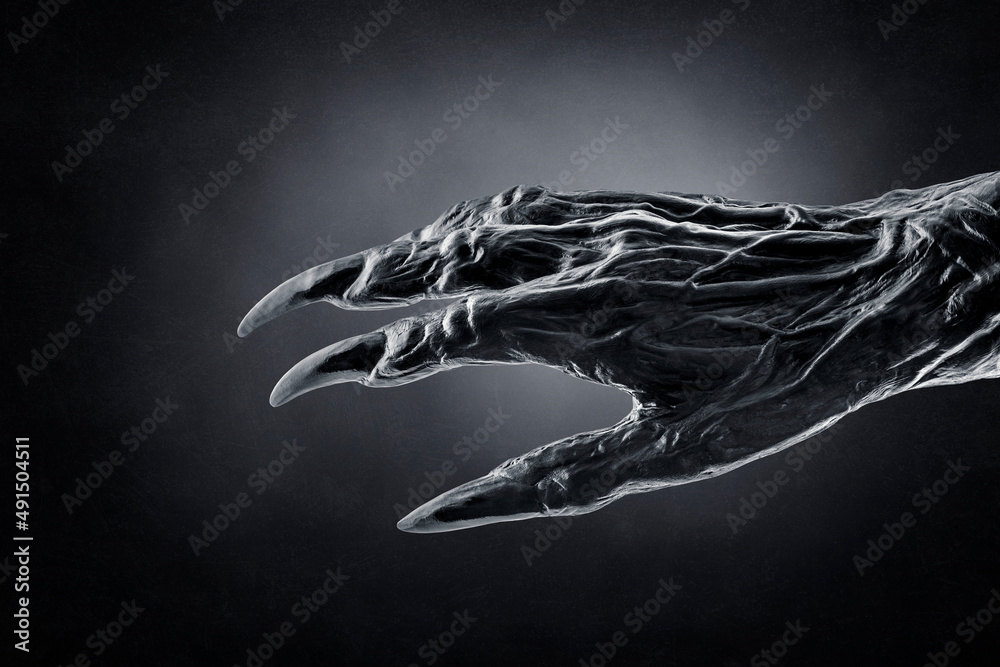 Creepy monster claw over dark misty background Stock Photo | Adobe Stock
