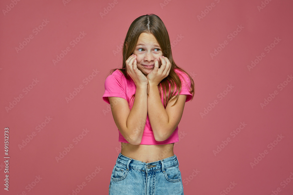 Scared child girl frightened terrified by domestic violence on pink ...