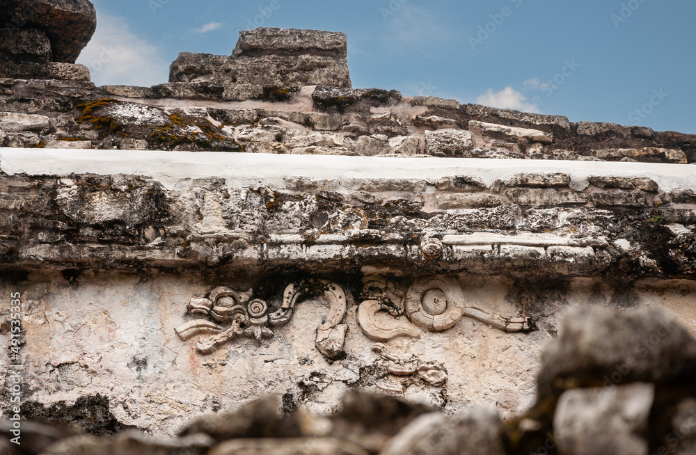 Palace wall with a carved serpent at Palenque Archaeological site in ...