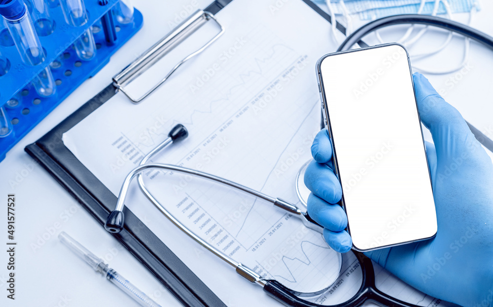 Cellphone mockup. Syringe with needle, hospital healthcare charts ...