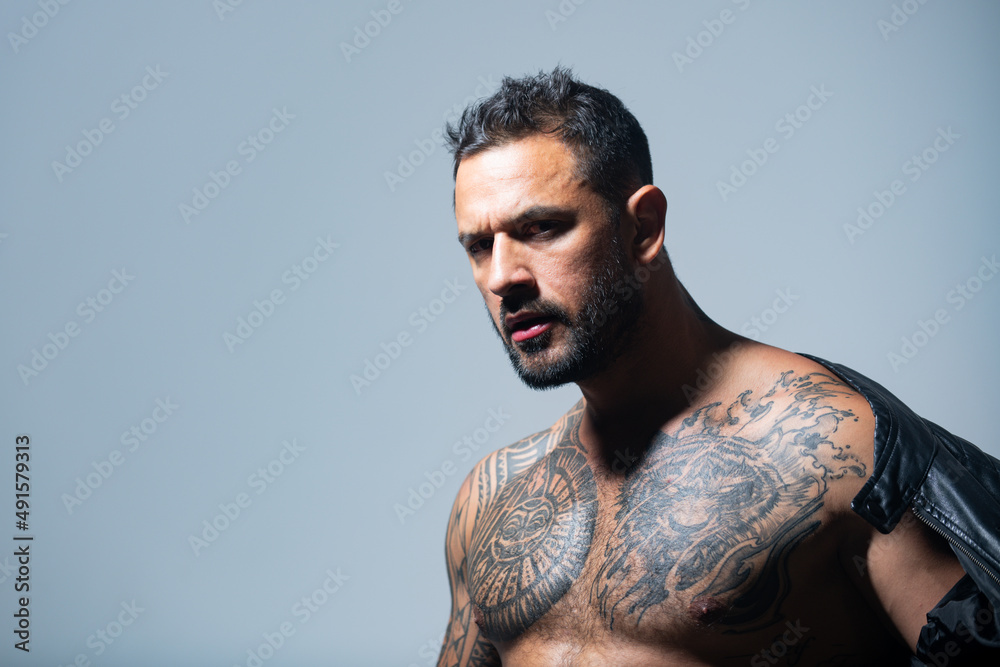 Seductive face of a sexy man. Macho looking confident. Stock Photo ...