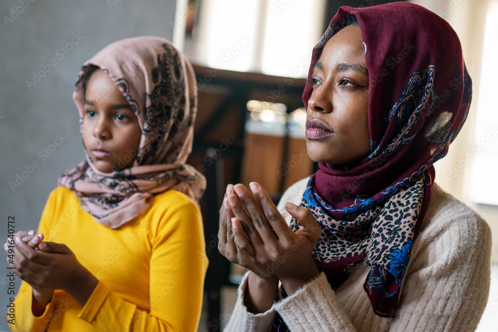 Portrait of muslim mother with child during islamic religious cultural ...