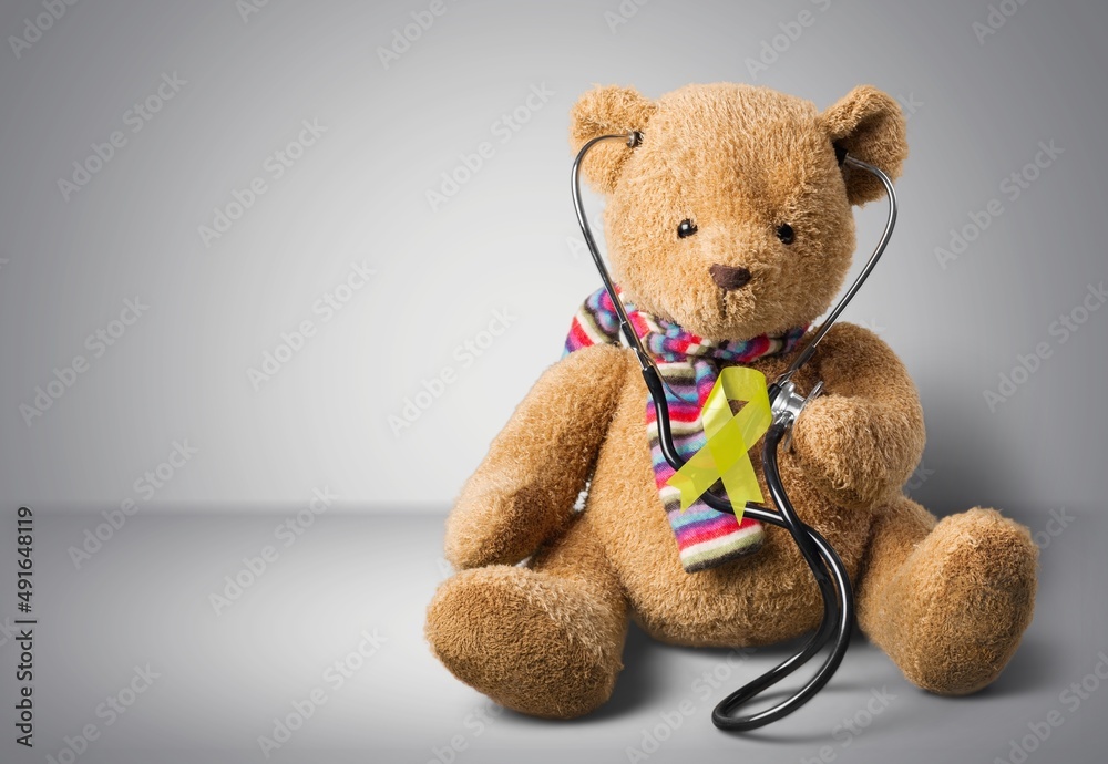 International Childhood Cancer Awareness month, Children toy with ...