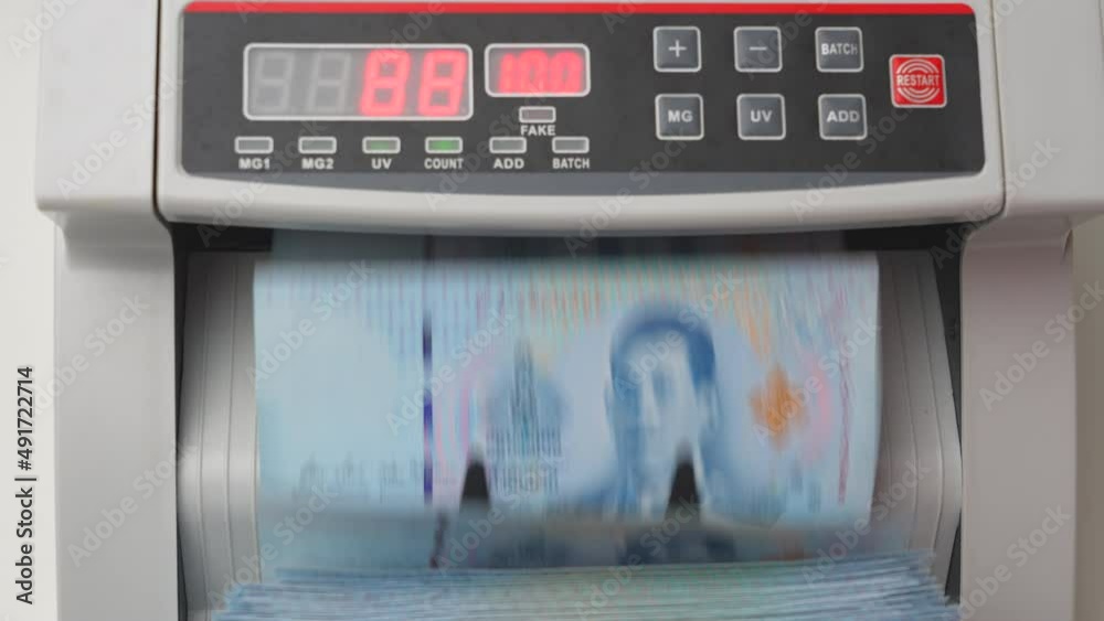 Thai Baht money counting in Machine. Paper THB Thai baht banknotes ...